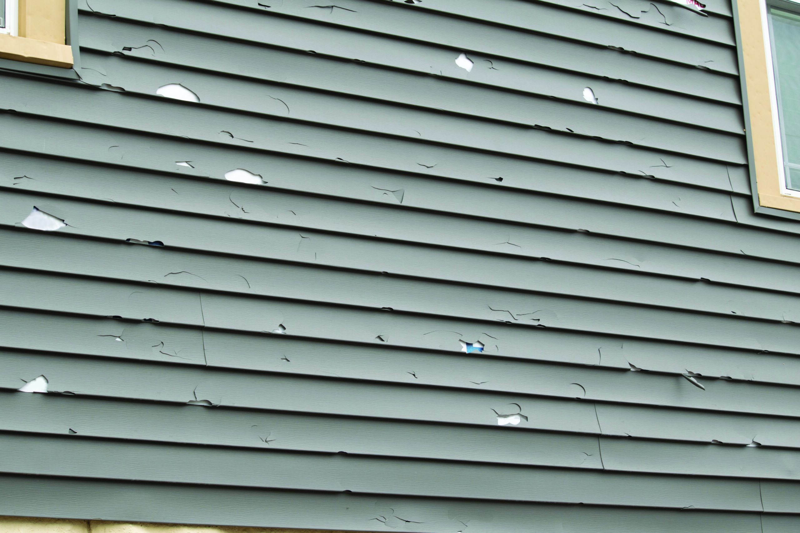 Hail Damage? Filing Insurance Claims for Siding Repairs - Roof Tech